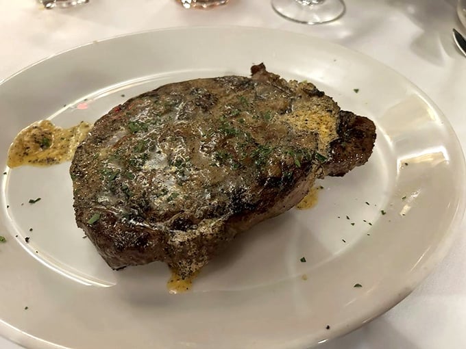 Some say size doesn't matter, but when it comes to this perfectly cooked prime rib eye, generous proportions are definitely part of the appeal.