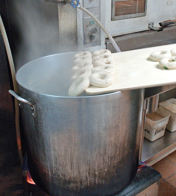The bagel birth canal&mdash;watching these doughy rings take their hot bath before becoming the heroes of your breakfast story.