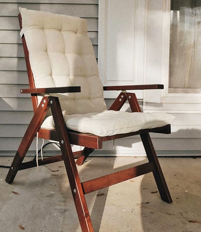 That mid-century chair isn't just furniture—it's a time machine waiting to transport someone's porch into a whole new era.