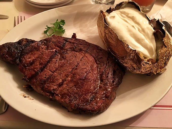 Another angle of steak perfection&mdash;where the char meets the pink in that magical zone that makes grown adults close their eyes in silent gratitude.
