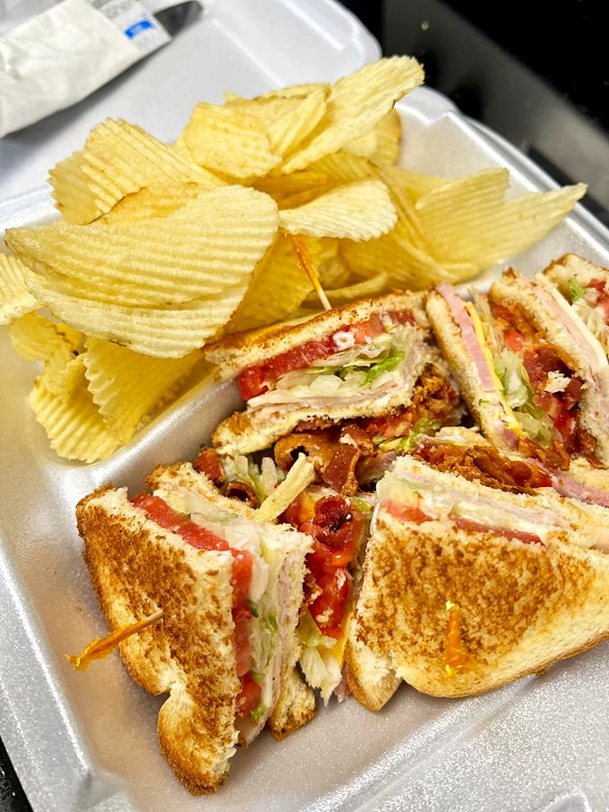 A club sandwich that's stacked higher than Kentucky basketball expectations, with perfectly toasted bread that makes potato chips seem like necessary architecture.