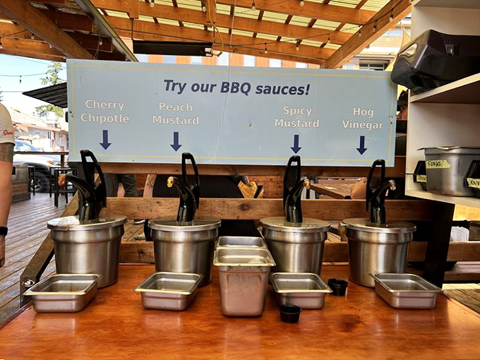 Sauce station showdown: Cherry Chipotle, Peach Mustard, Spicy Mustard, and Hog Vinegar. Choose your fighter or try the whole squadron.
