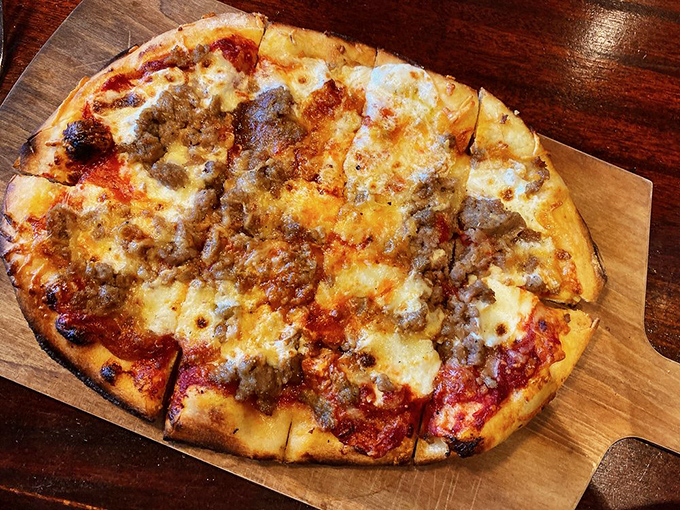This pizza doesn't just have sausage&mdash;it looks like it's hosting a neighborhood block party of flavors that everyone wants to attend.