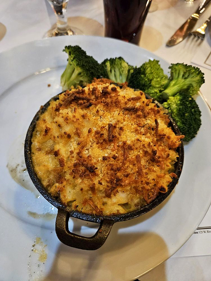 Mac and cheese gets the coastal treatment&mdash;a golden crown of cheese hiding a treasure trove of seafood beneath.