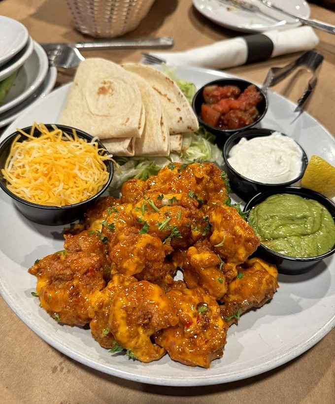 These aren't just any shrimp tacos&mdash;they're vacation on a plate, complete with enough toppings to make decision-making a delicious dilemma.