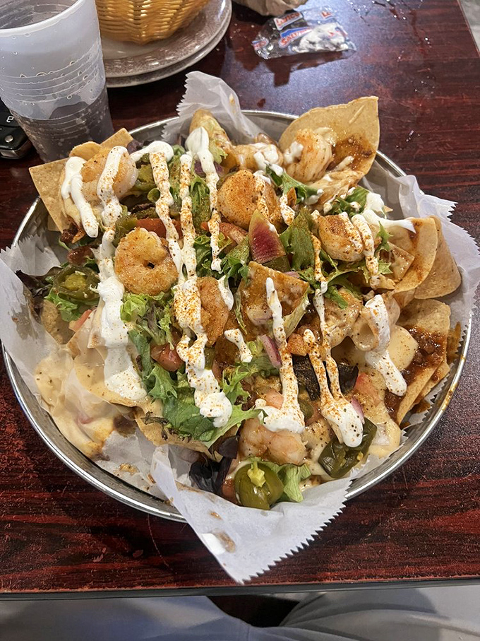 Seafood nachos that make you question why you've wasted time on lesser versions. Every chip a potential trophy winner.