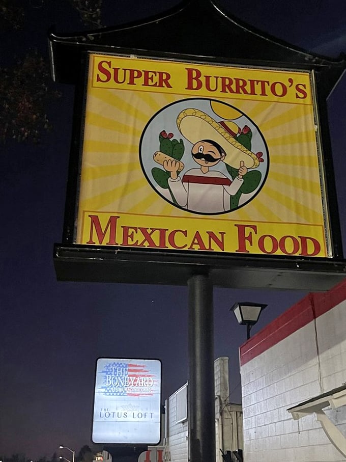 The cheerful cartoon mascot welcomes you with open arms and a twirled mustache. He knows what you need before you do.