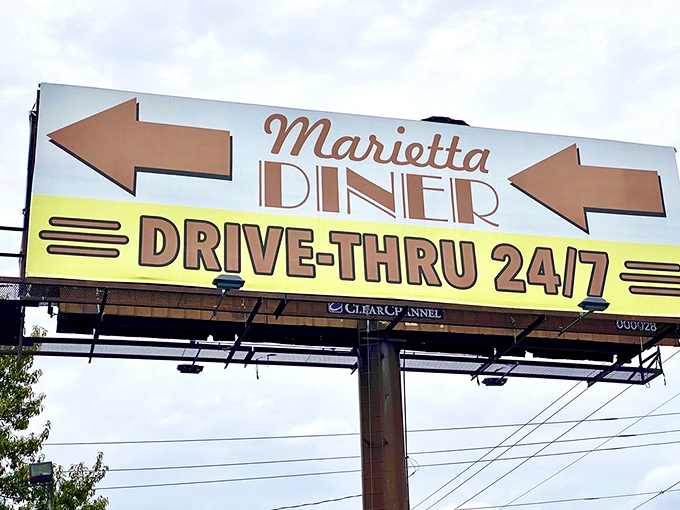 The billboard says it all&mdash;24/7 access to diner magic. Like Vegas for comfort food enthusiasts, the neon arrows point to salvation.