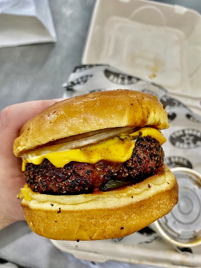 The Fox Bros "burger" laughs at convention, replacing the patty with chopped brisket that makes beef jealous of itself.