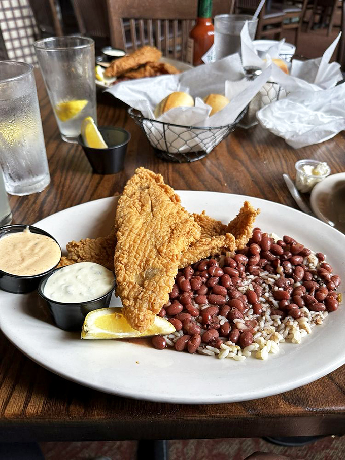 Southern fried catfish with the crispness of a winter morning and sides that don't know the meaning of "afterthought." That sauce duo is the diplomatic relations team.