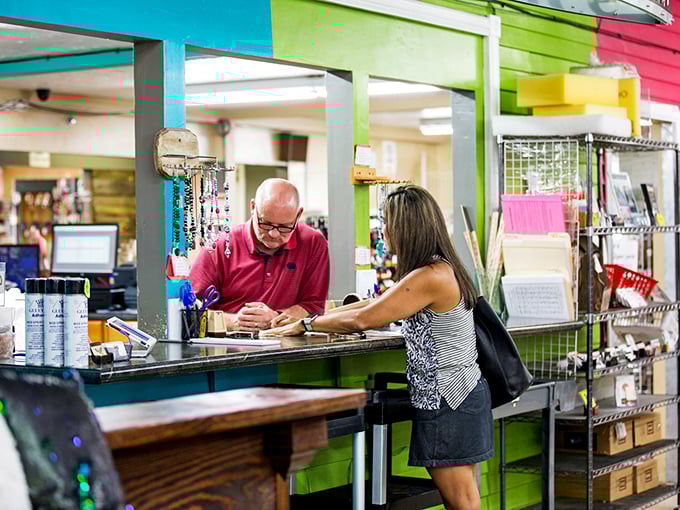 The fabric whisperers at work. These experts can translate your vague "something bluish" into exactly the textile you've been dreaming of.