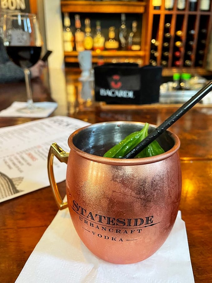 The copper mug isn't just showing off&mdash;it's keeping this Moscow Mule perfectly chilled while that jalape&ntilde;o brings the conversation to life.