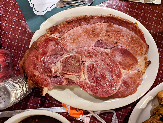 A steak so massive it deserves its own zip code. The kind of meat that makes vegetarians momentarily question their life choices.