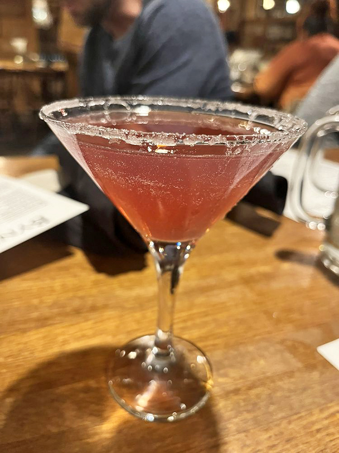 The sugar-rimmed martini glass holds what appears to be liquid ruby&mdash;a strawberry concoction that's both elegant and dangerously sippable.