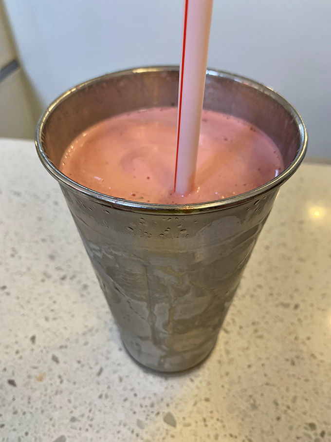 The metal mixing cup isn't just a vessel&mdash;it's a promise of extra milkshake waiting in the wings. Arm workout included at no additional charge.