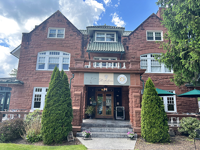 The Thistledown at Seger House stands proudly in rose-colored sandstone, offering elegant accommodations that say, "Yes, you've definitely left the chain hotels behind."