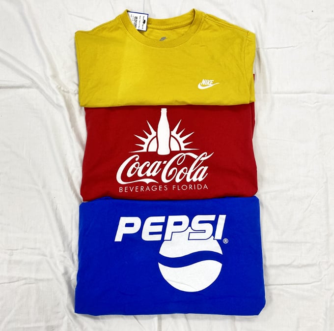 The soda rivalry continues in fabric form. These vintage tees tell stories of corporate America that taste better than any soft drink ever could.