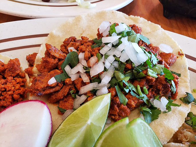 Al pastor tacos: where marinated pork meets pineapple in a flavor marriage so perfect it should have its own reality show.