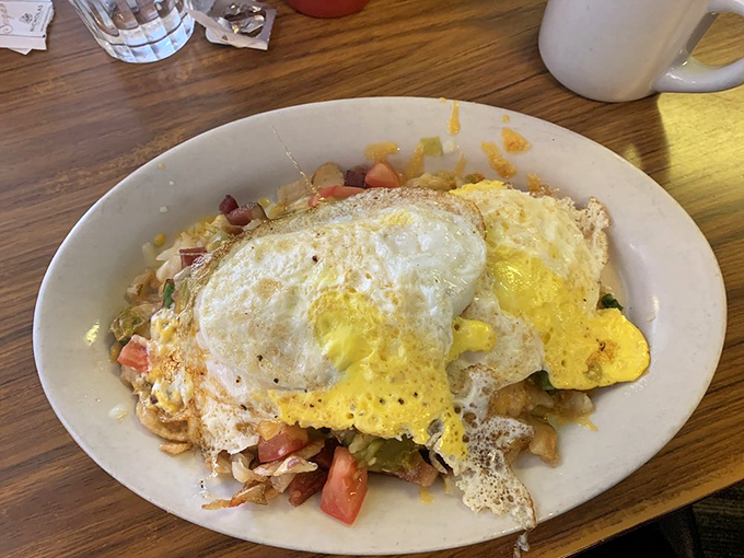 The Buffalo Chip in all its glory—a geological formation of potatoes, cheese, and happiness that could sustain a small village.