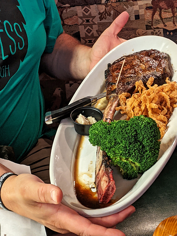 When your steak arrives with its own handle, you know you've made excellent life choices. Broccoli included for the illusion of balance.