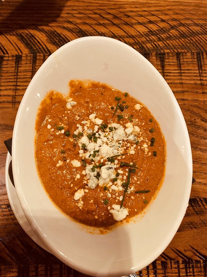 Tomato bisque that's souper-natural! This velvety bowl of goodness is like a warm hug for your taste buds, topped with a sprinkle of cheese confetti.