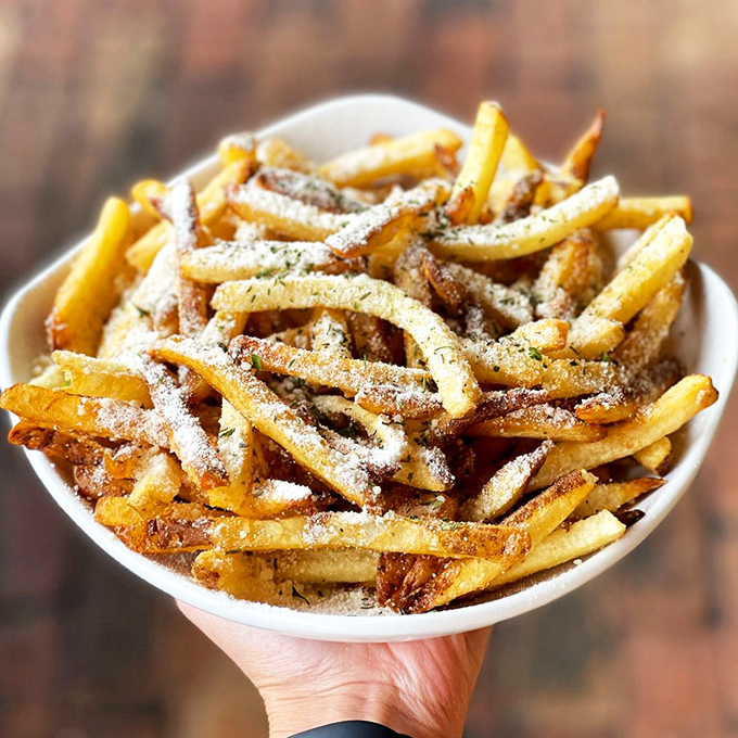 These aren't just fries&mdash;they're golden happiness sticks dusted with parmesan fairy dust. Diet culture wept when these were invented.