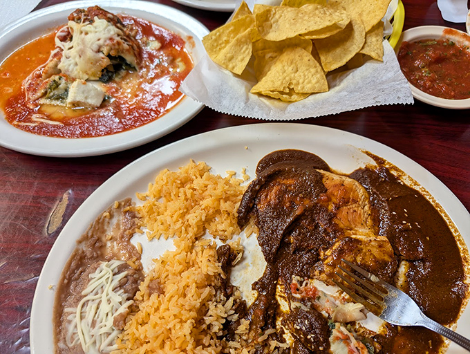 The legendary mole poblano, dark as midnight and complex as jazz, shares the spotlight with cheese-draped enchiladas and rice that's never an afterthought.