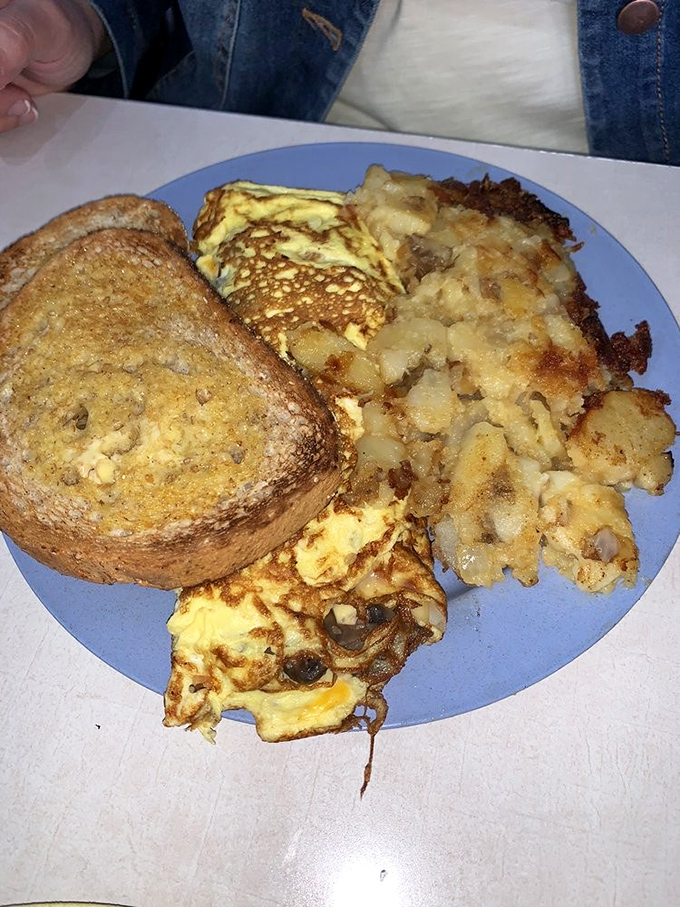 The Belgian waffle that makes you question why you ever settled for lesser breakfast pastries, crowned with strawberries and whipped cream royalty.