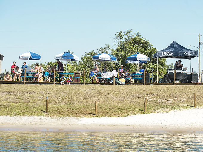 The floating playground becomes a social network where strangers become friends united by a common goal: conquering that wobbly balance beam.