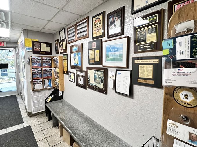 The wall of fame tells stories of decades past. Each frame is a chapter in the Blue Bonnet's delicious history.
