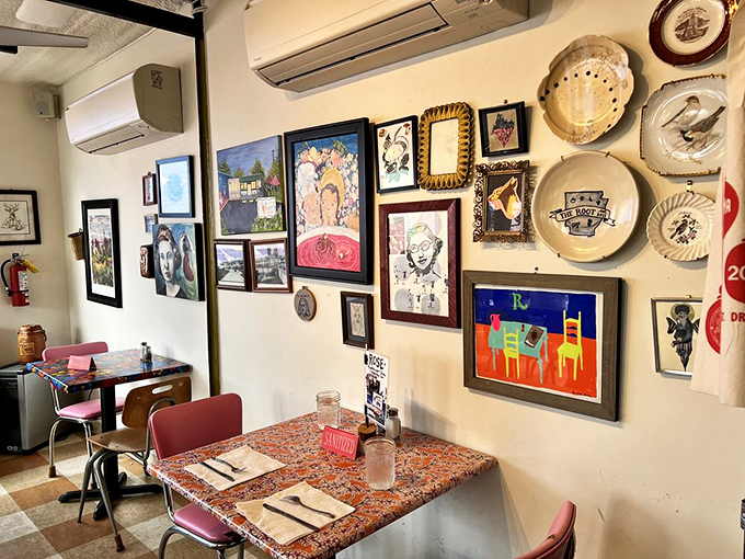 Every inch of wall space tells a story &ndash; a curated chaos of local art and vintage plates that feels both random and perfectly intentional.