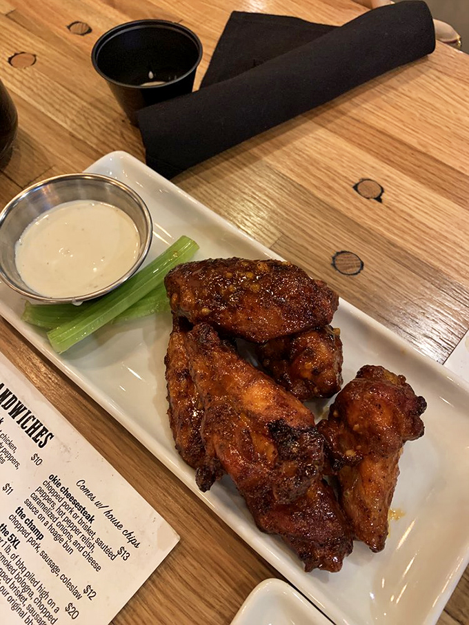 Wings that make you question why we even bother with the rest of the chicken. Crispy, saucy perfection with cooling celery standing by.