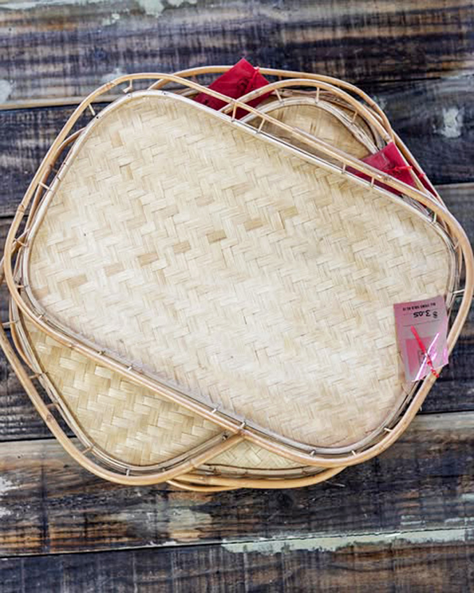 Woven serving trays that survived countless potlucks and family gatherings. At $3.95, they're practically begging to display your next charcuterie board.