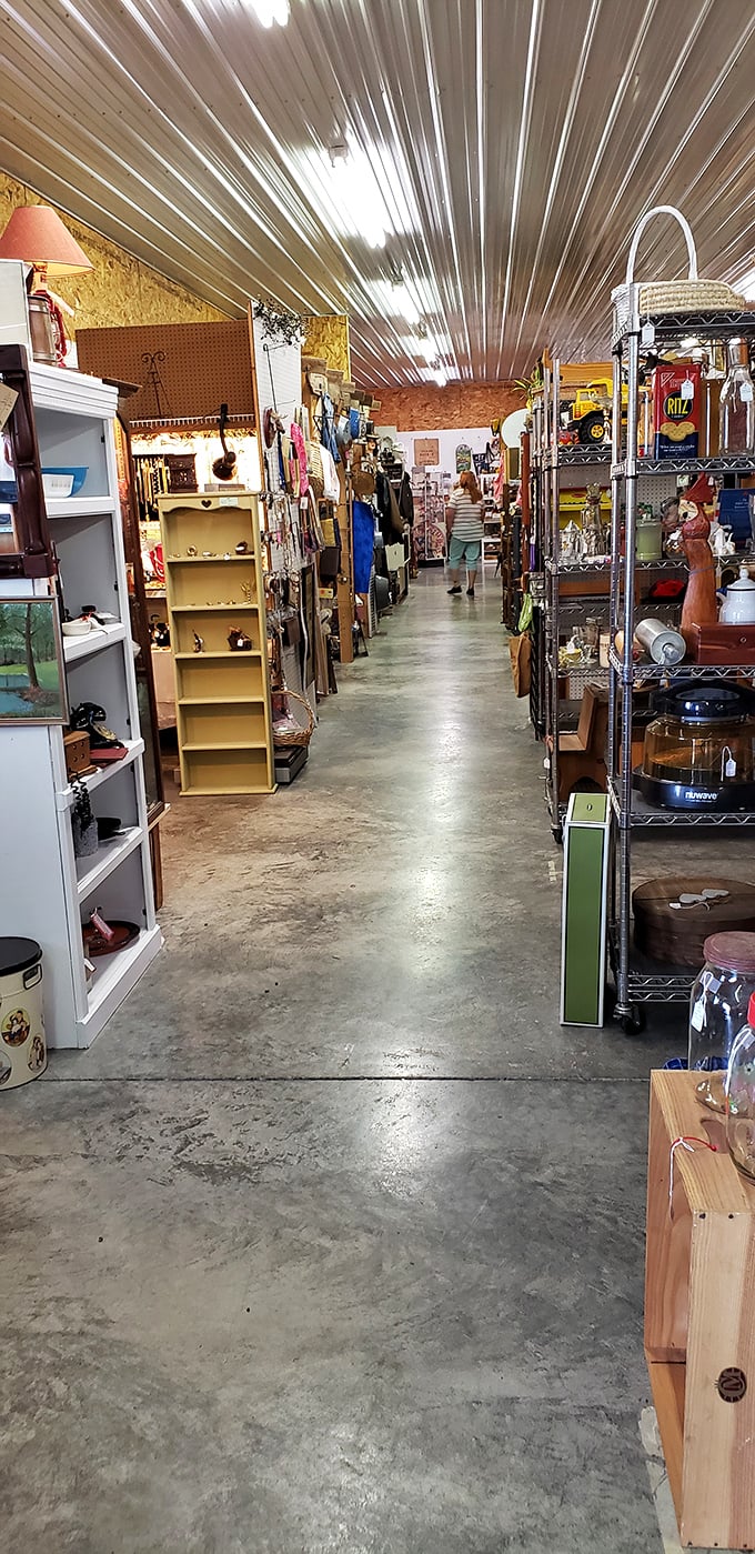 The silver ceiling reflects endless possibilities down these well-worn paths. Each shopper's journey is a choose-your-own-adventure in bargain hunting.