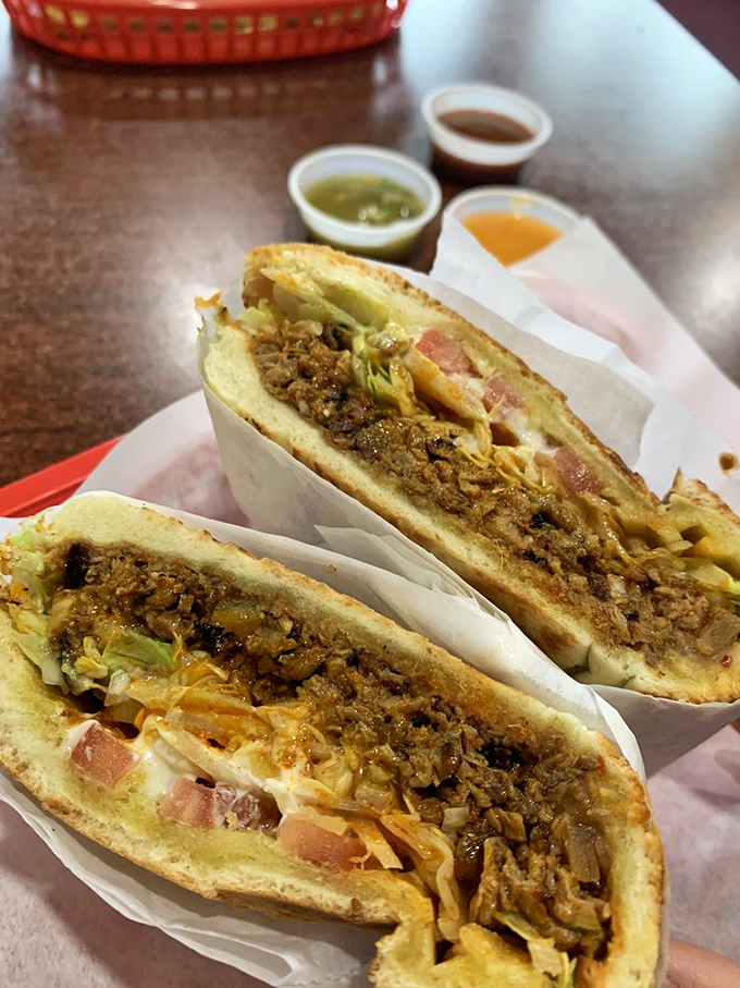 The torta &ndash; Mexico's answer to the sandwich &ndash; gets the royal treatment with layers of al pastor, fresh veggies, and enough fillings to challenge any jaw span.