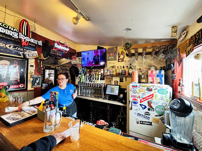 The bar area&mdash;where dollar bills cling to surfaces like memories and every beer sign tells a story of good times past and future.