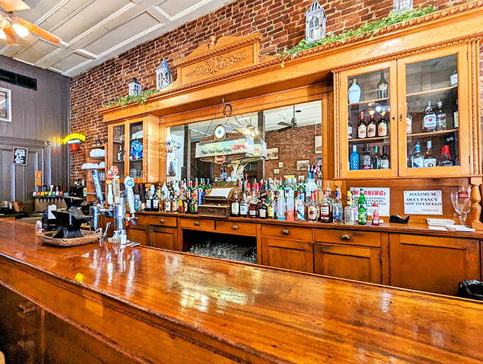 A bar that would make Hemingway feel at home—gleaming wood, well-stocked spirits, and the promise of conversations worth remembering the next morning.