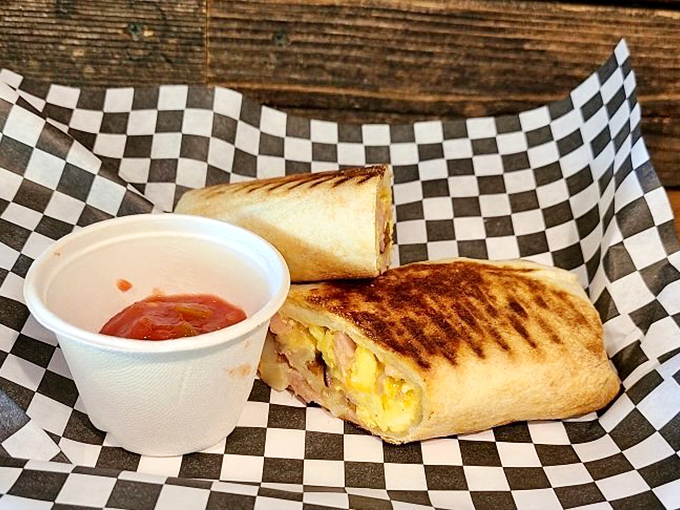 Breakfast meets lunch in this portable miracle. The grill marks tell me someone cares about texture as much as taste.