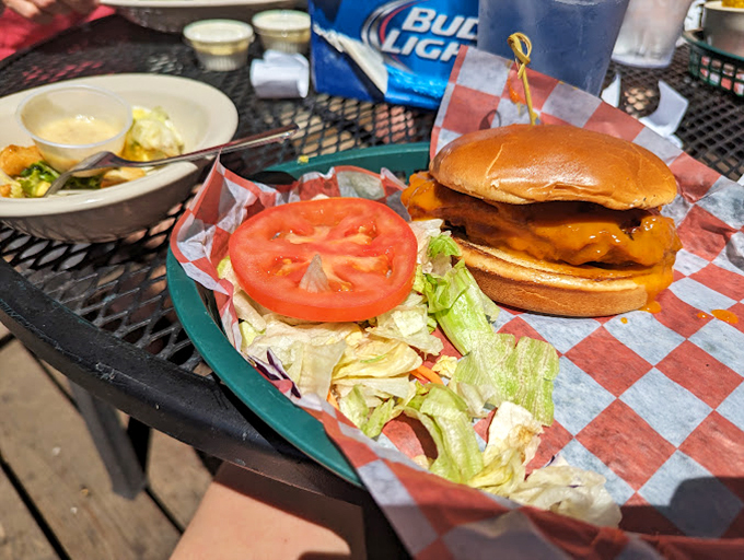 This isn't just a burger &ndash; it's edible architecture! Perfectly stacked with that melty cheese cascading down the sides like a delicious waterfall.