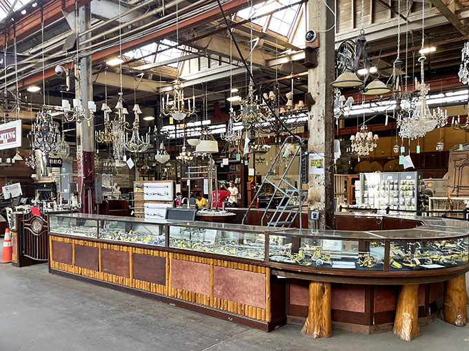 Crystal chandeliers hanging like elegant stalactites in a cave of vintage lighting&mdash;each one ready to transform your ceiling from forgettable to fabulous.