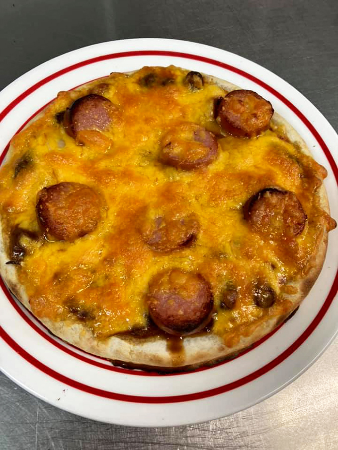 Their flat bread creation defies pizza laws with sausage rounds standing proud on a sea of melted cheese. The comfort food crossover episode we didn't know we needed.