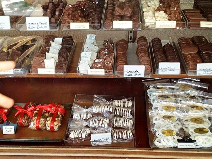 Chocolate-covered dreams meticulously labeled and waiting for adoption. Like dating profiles for candy &ndash; each one promising a unique relationship with your taste buds.