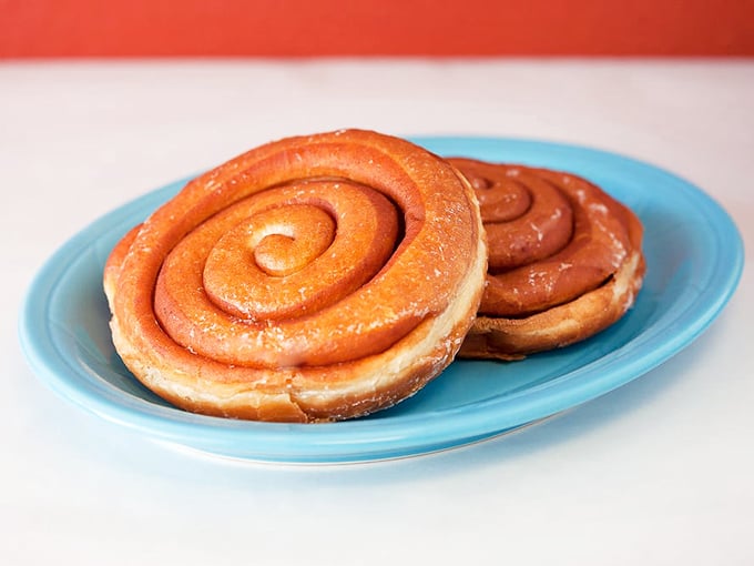 Cinnamon rolls with perfect spirals that hypnotize you into submission. Resistance is futile, and frankly, why would you even try? 