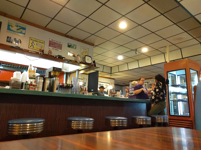 The counter&mdash;where solo diners become regulars, secrets are shared with strangers, and breakfast tastes better for mysterious reasons.