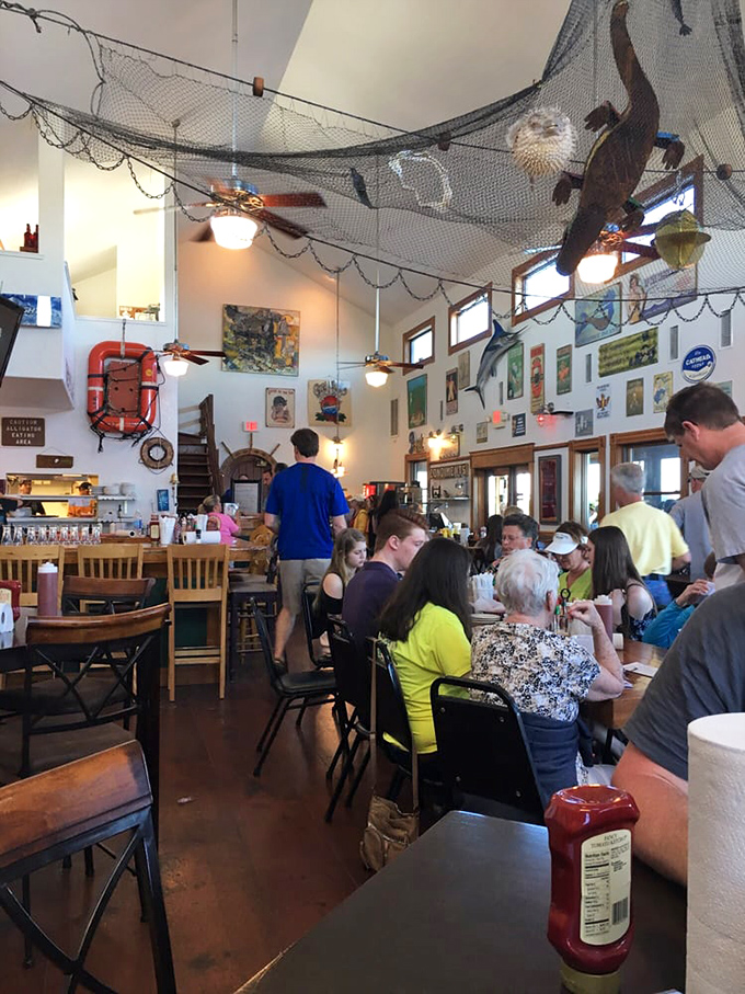 Where fishing nets double as ceiling decor and conversations flow as freely as the seafood. Everyone's a local after one meal here.