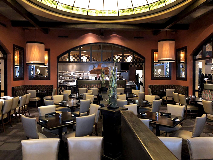 Under a stunning stained-glass dome, diners experience what might be the closest thing to a coastal sunset Kansas has to offer.