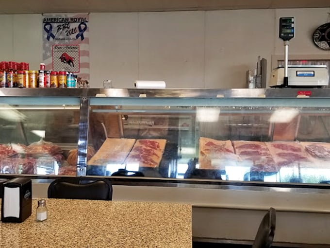 The meat case: where carnivorous dreams begin. Fresh cuts await their destiny, ready to become tomorrow's tacos and tamales.