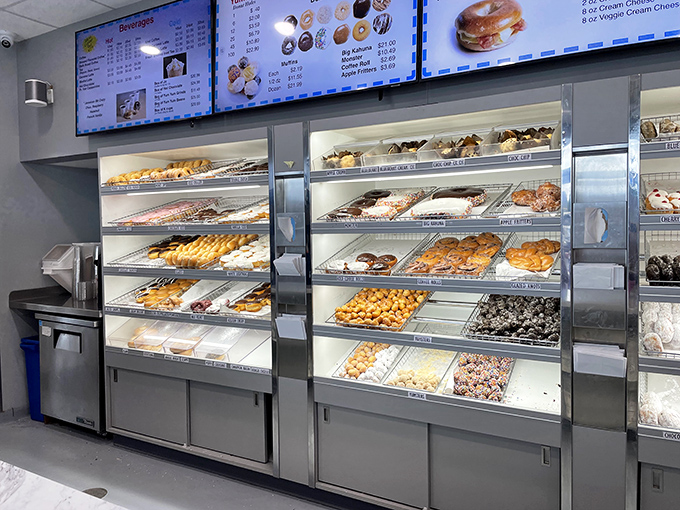 The display case creates the same flutter of excitement adults feel that children experience at toy stores. Sugar-dusted decisions await.