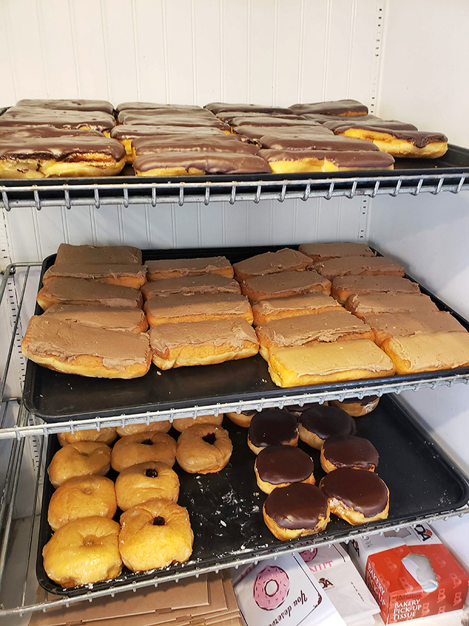Chocolate and maple bars lined up like edible gold bars. If Fort Knox stored desserts instead of bullion, it would look like this.