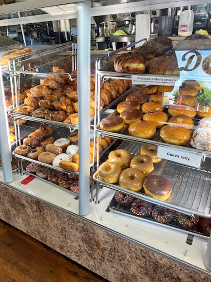 Donut nirvana awaits behind this display case. The hardest workout you'll get is the mental gymnastics deciding which ones to choose.